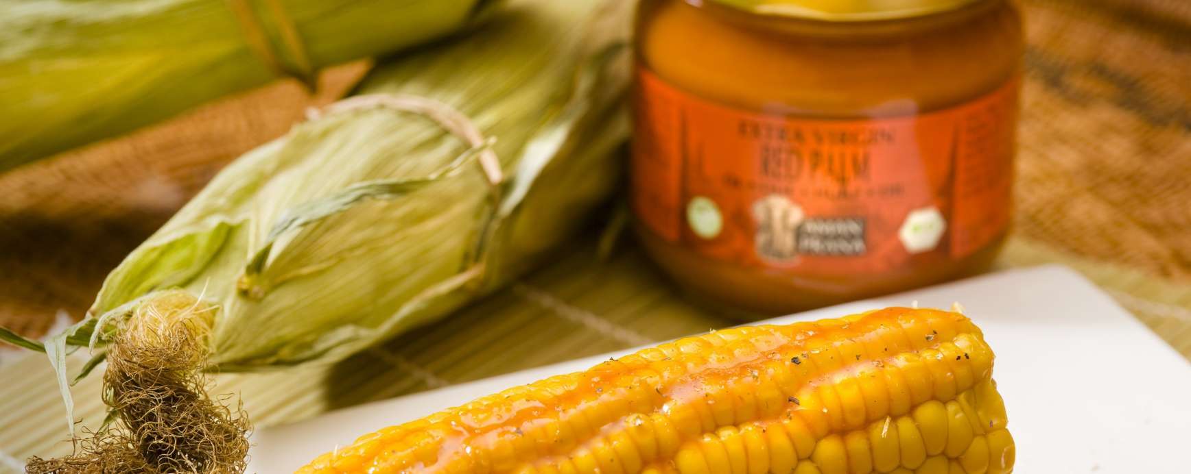Corn on the cob with red palm oil and khoisan fleur de sel - Amanprana ...